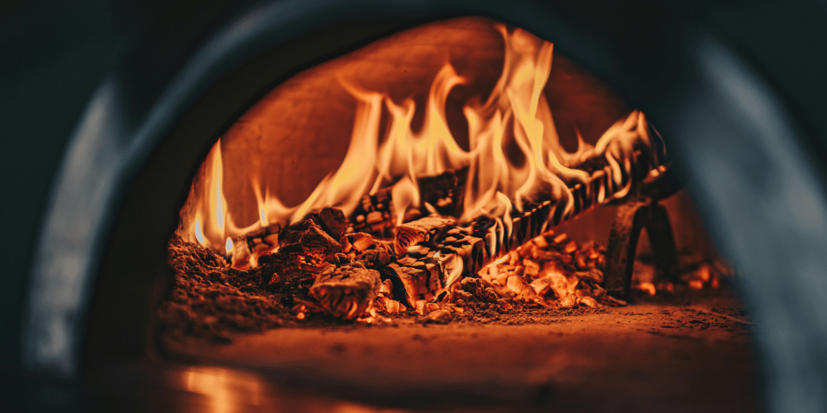 How to Safely and Efficiently Cook Over a Wood Fire